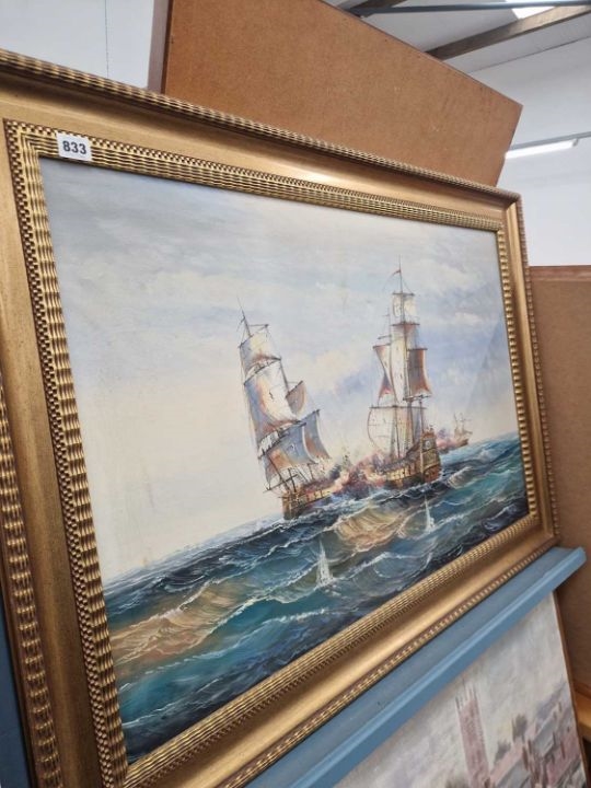 J. Harvey | A large oil painting of battle ships signed by J. Harvey ...