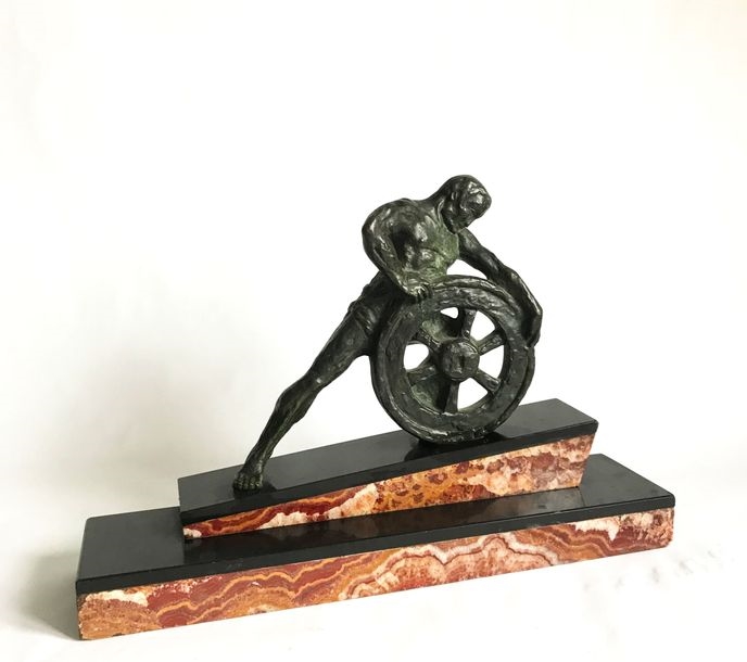 Michel Decoux | L'homme à la roue Bronze à patine verte | MutualArt