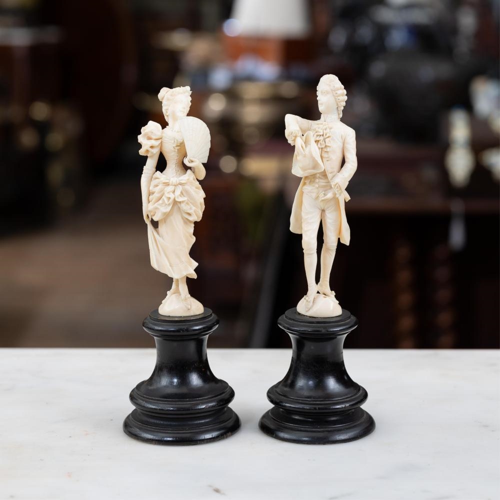 French School | A pair of French carved ivory court figures on turned ...