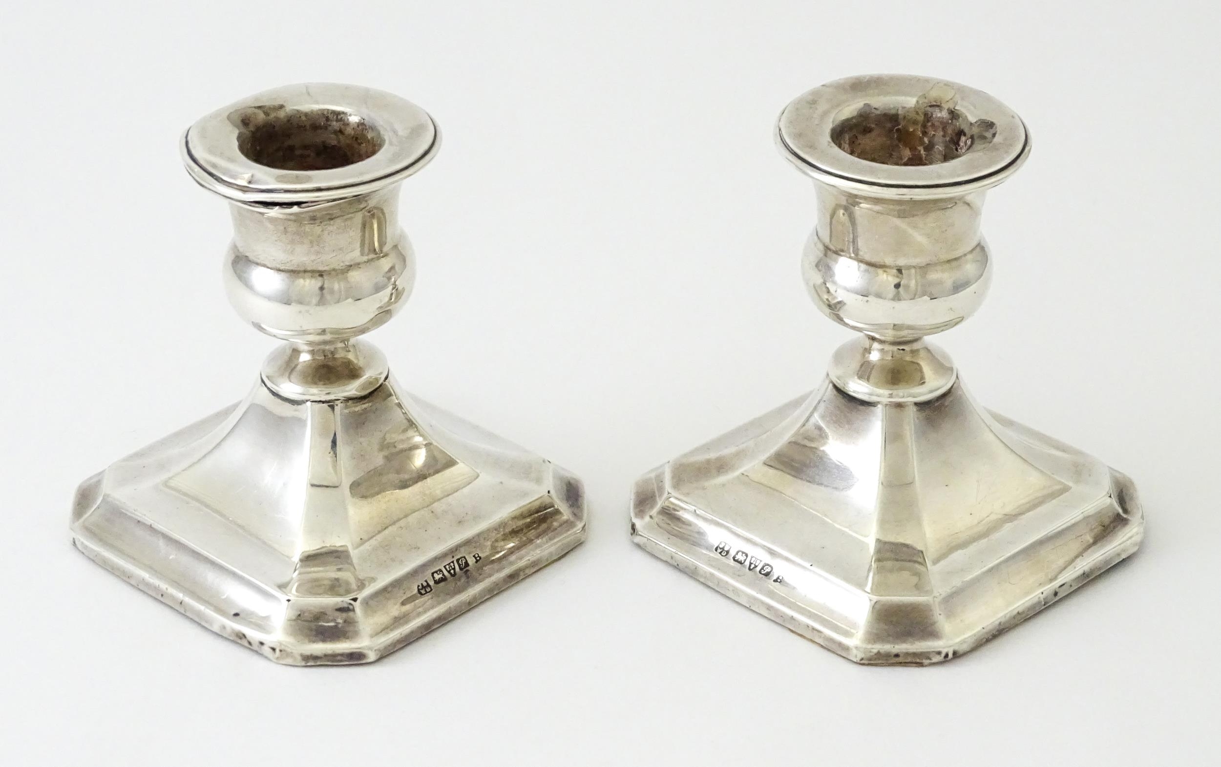 James Deakin | A pair of silver candlesticks of squat form hallmarked ...