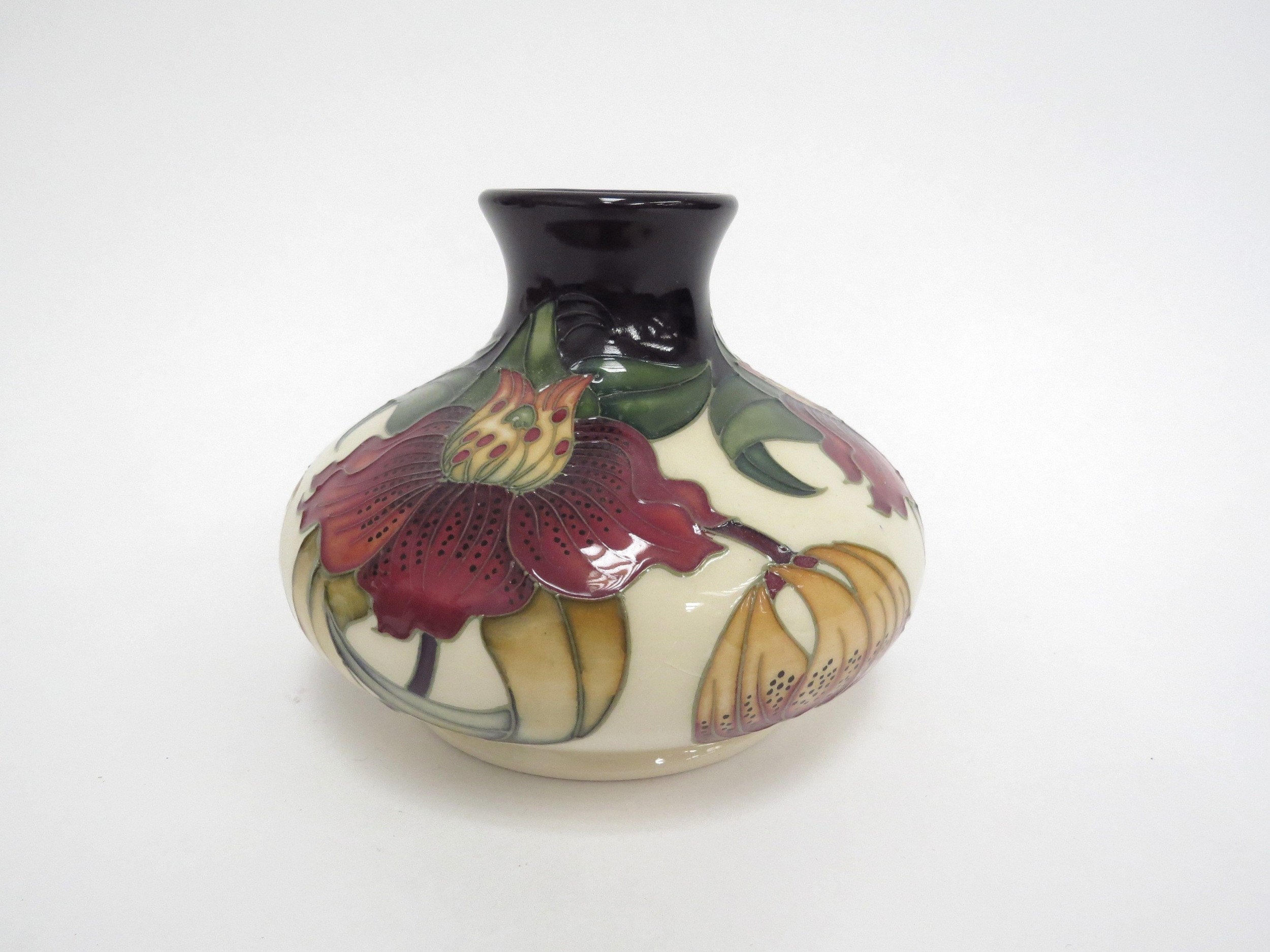 Nicola Slaney | A Moorcroft Anna Lily pattern squat form vase de ...