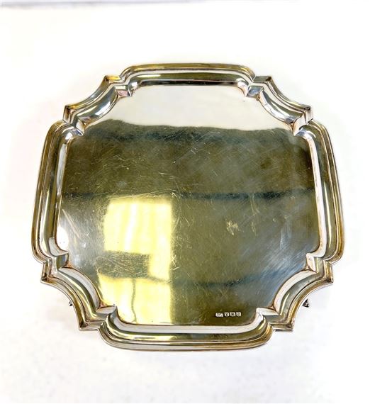 Sheffield | A Georgian style silver salver of shaped square form and ...