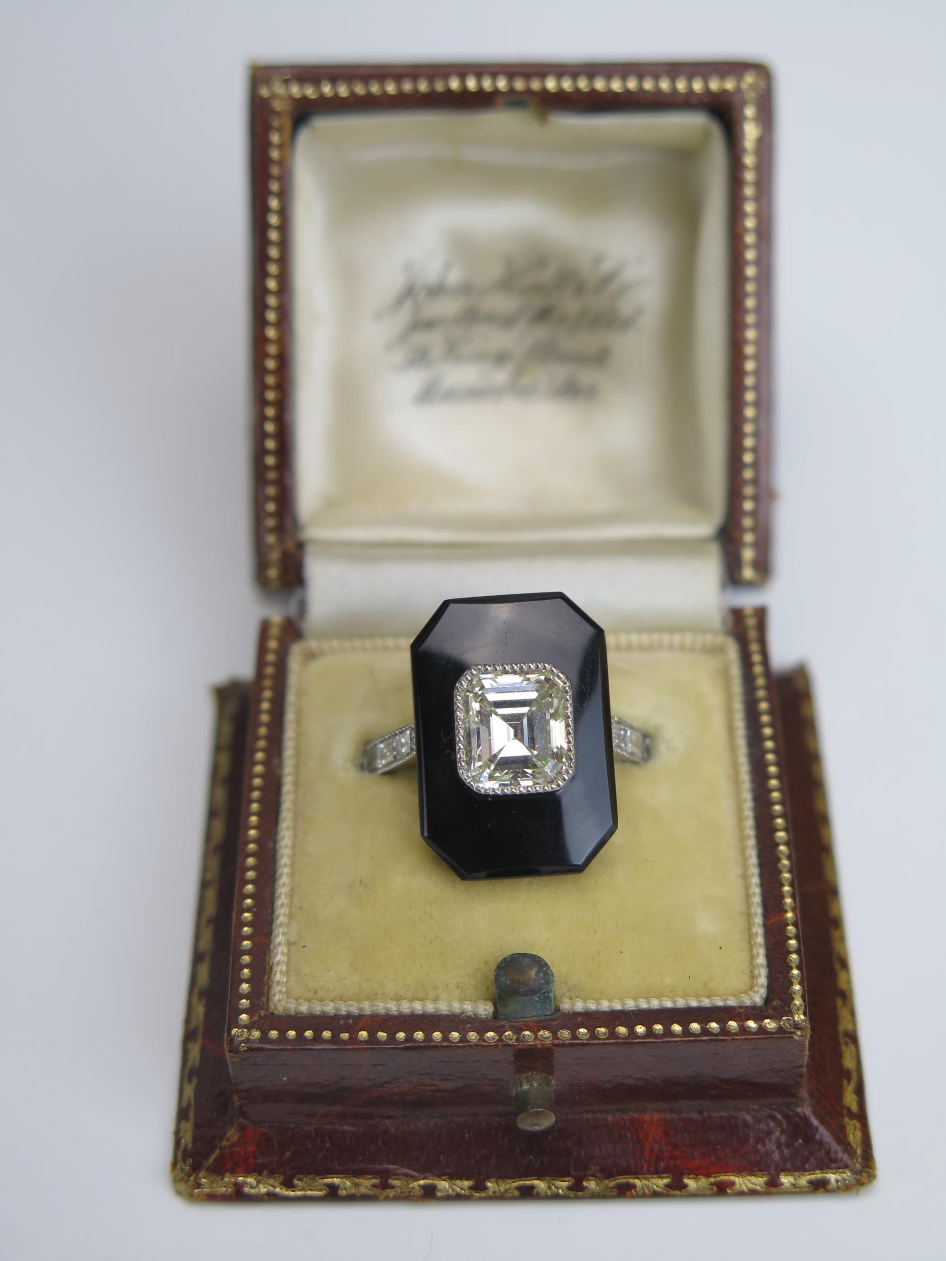 John Alexander Hall | An Emerald Cut Diamond and Onyx Ring in a ...