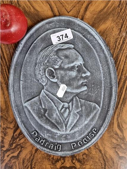 Padraig Pearse | A very heavy oval plaster cast showing the bust of ...