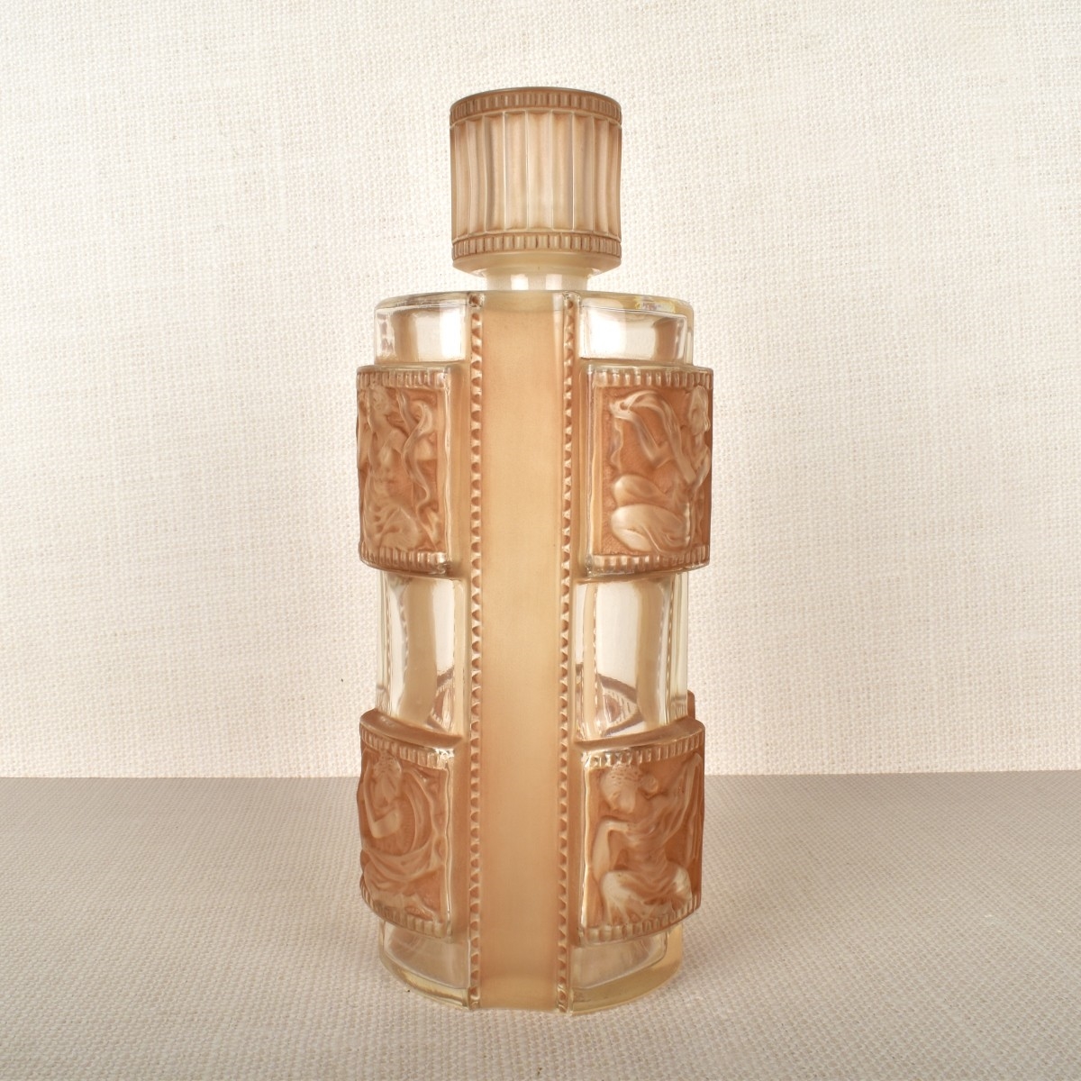 René Lalique | Helene- perfume bottle in clear glass with a sepia ...