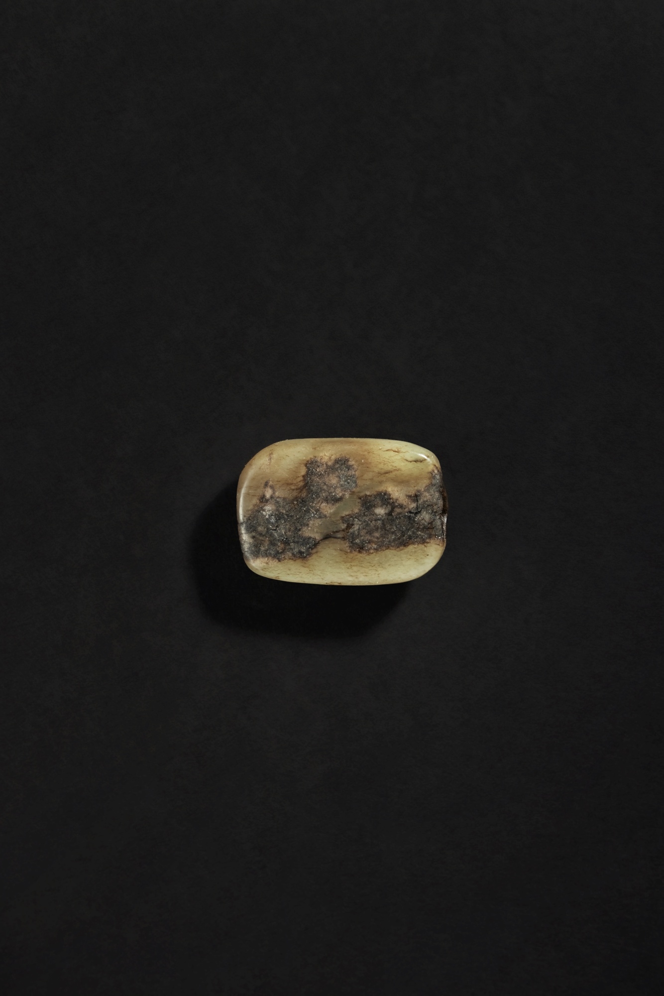 Han Dynasty | An archaic celadon and russet jade bead, Han dynasty ...