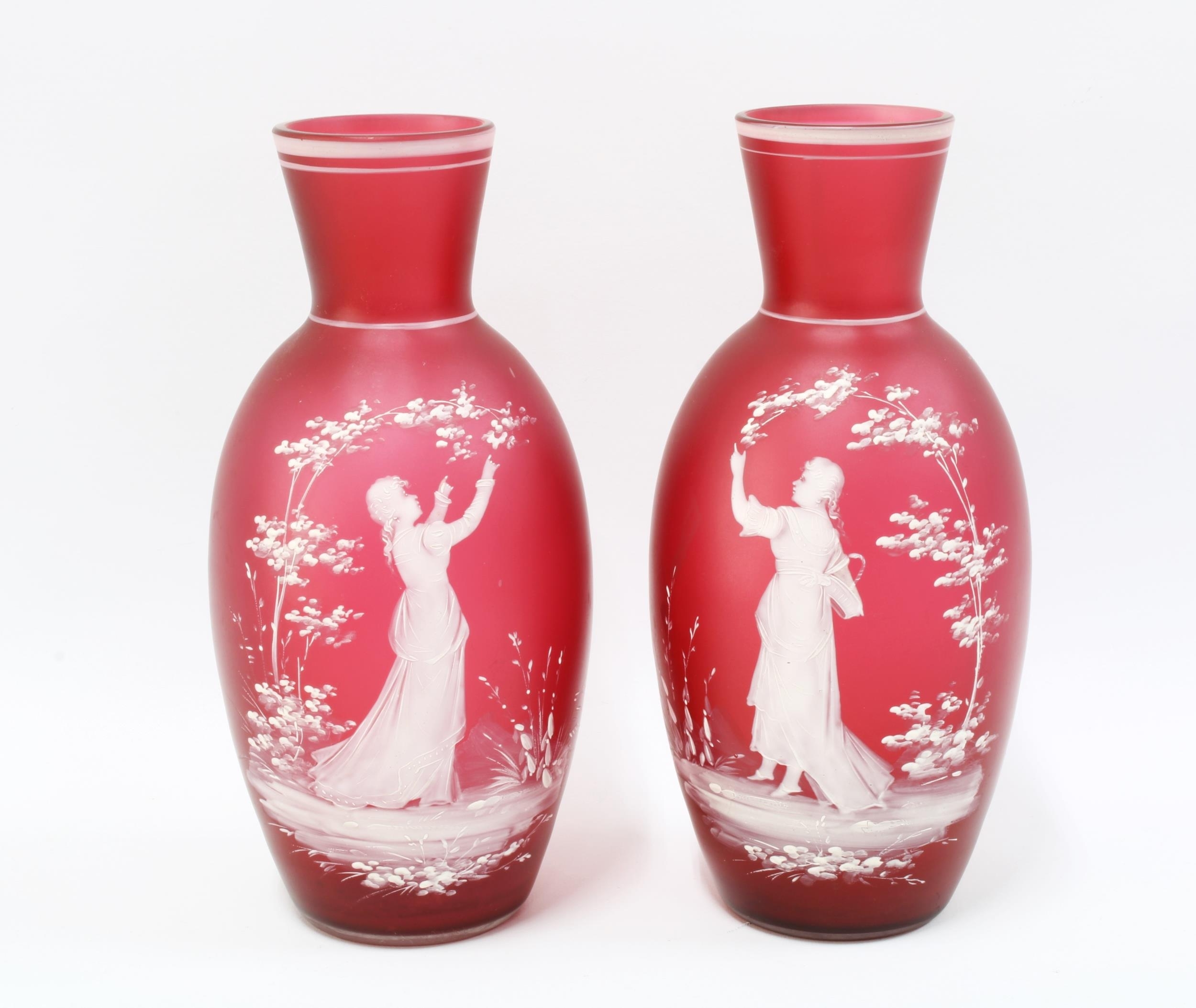 Mary Gregory | A pair of Mary Gregory cranberry glass baluster vases ...