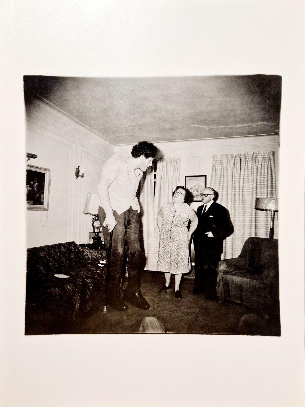 Diane Arbus | Diane Arbus - A Jewish giant at home with his parents in ...