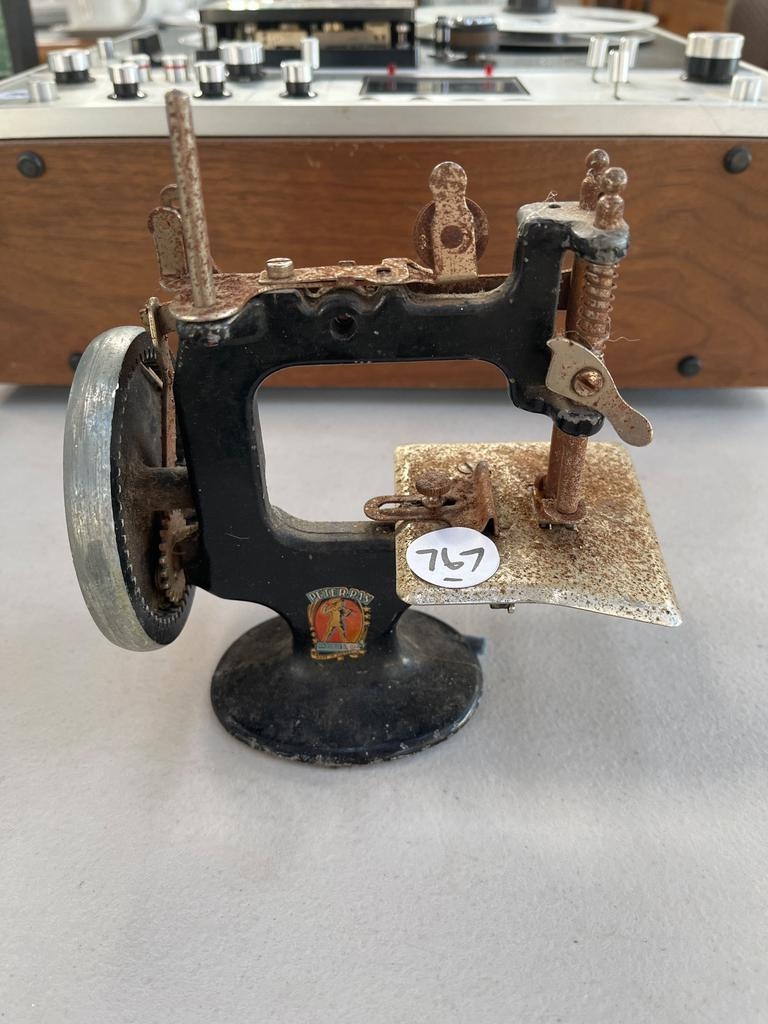 Peter Pan | PETER PAN MINIATURE SEWING MACHINE | MutualArt