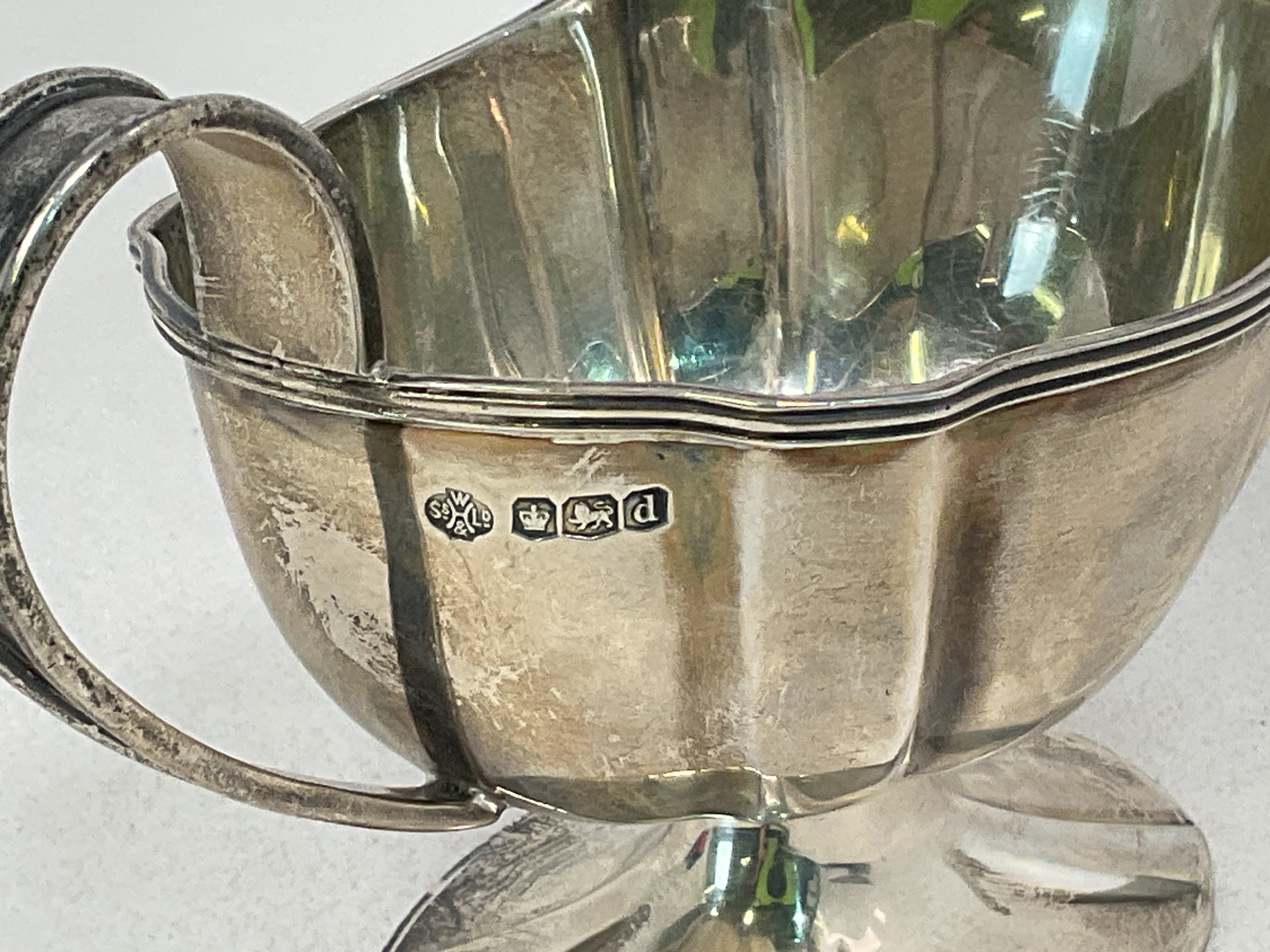 William Hutton & Sons | with simple loop handle and spreading oval foot ...