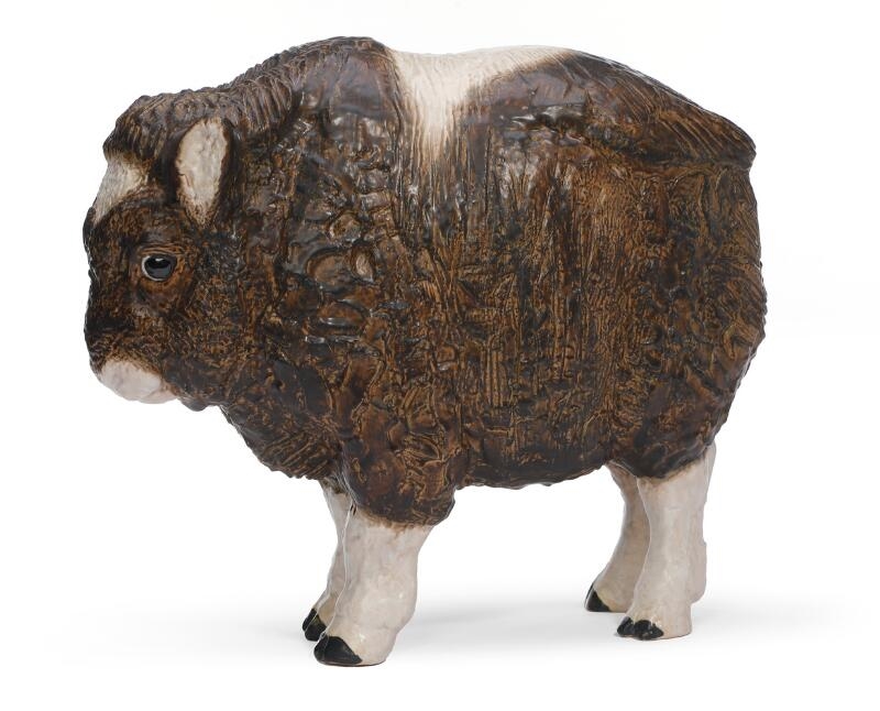 Jeanne Grut | A large faiance figure in the shape of a muskox calf ...