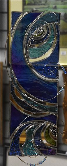 Sharon Baldry | A stained glass collage with wire swirls on a mirrored ...