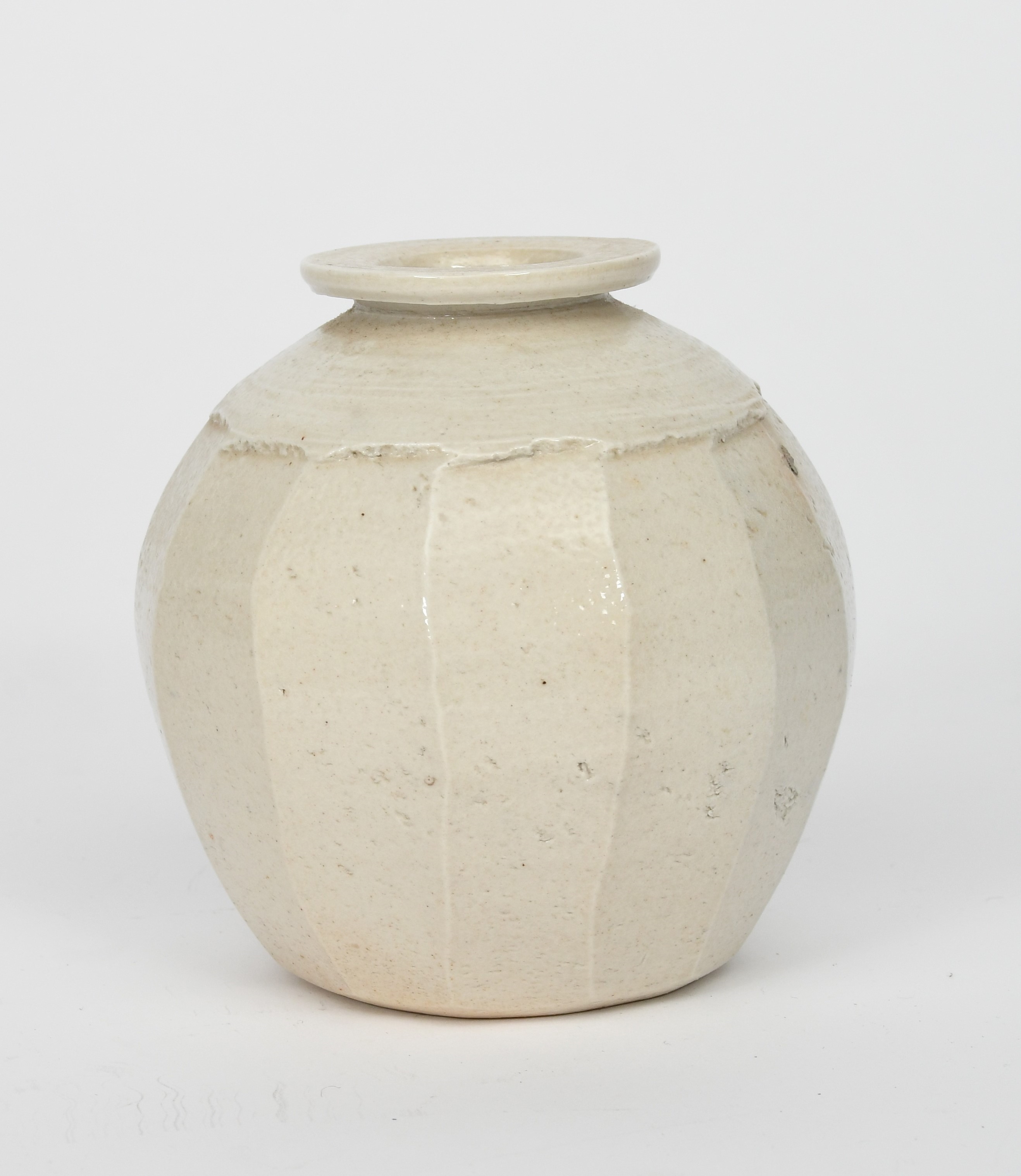 Richard Batterham | a small cut-sided porcelain vase, shouldered form ...