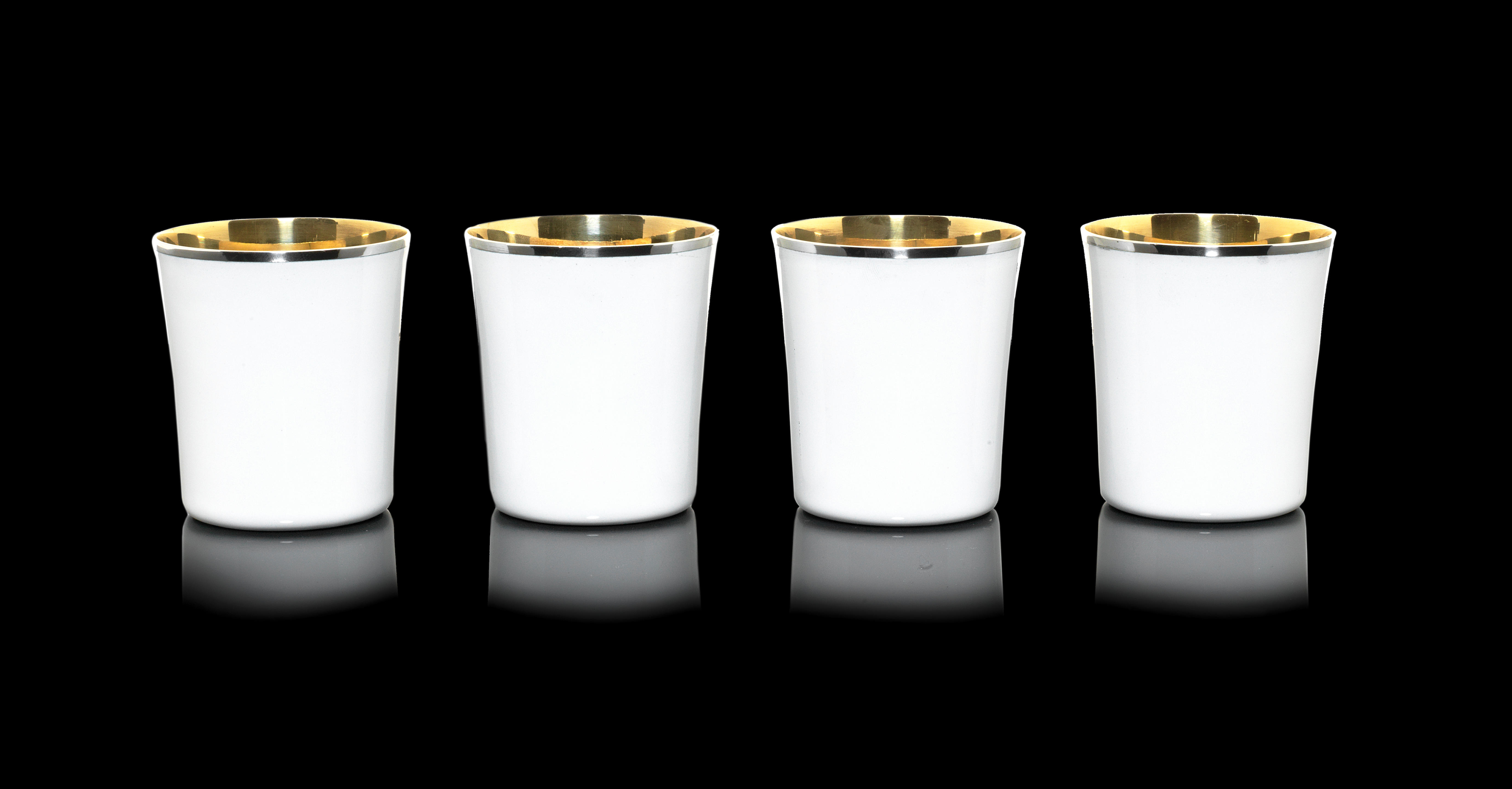 Gerald Benney | A set of four silver and white enamelled beakers (1973 ...