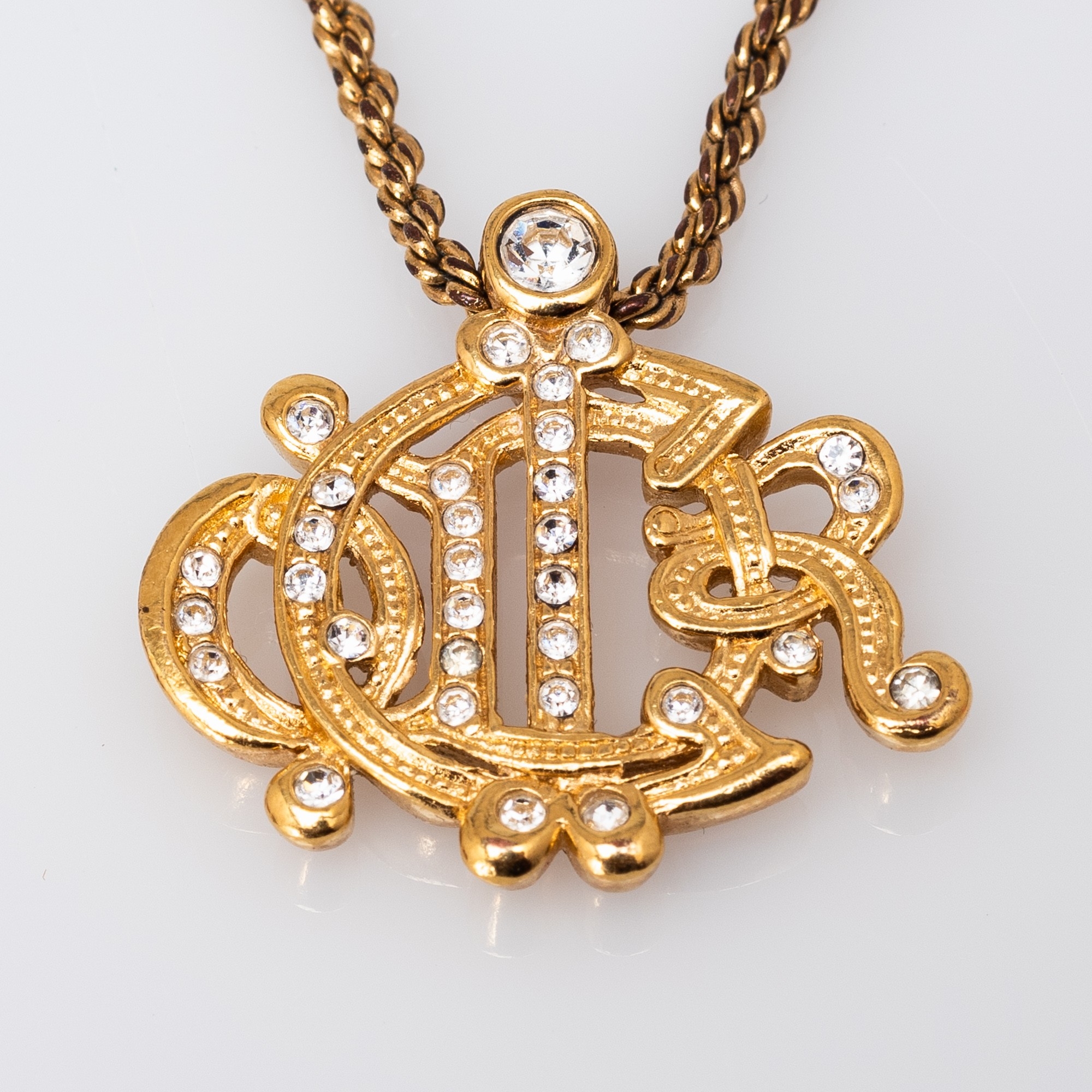 Christian Dior | Dior logo pendant | MutualArt
