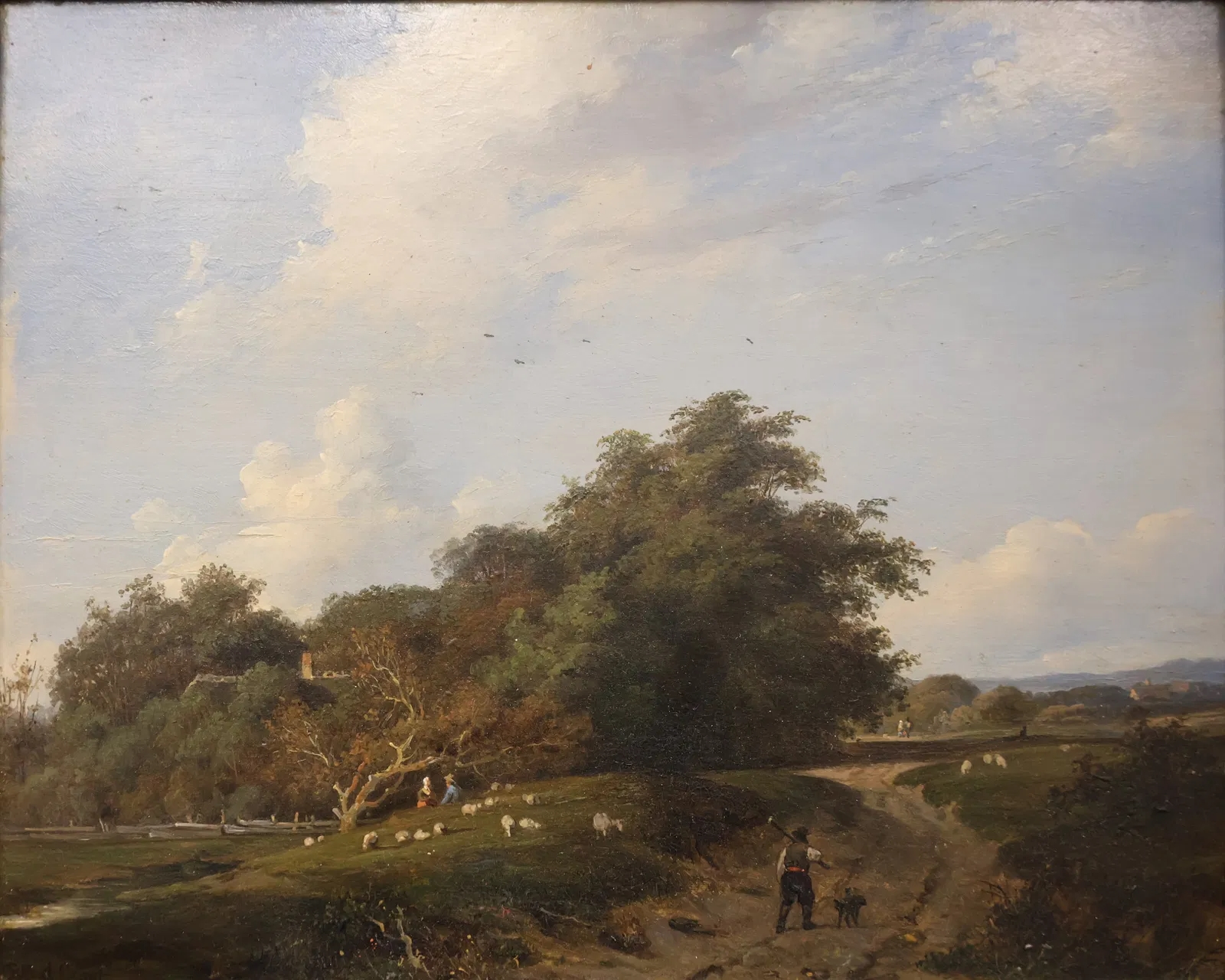 Jan Ernst de Groot | A pastoral scene with figures and sheep by a ...