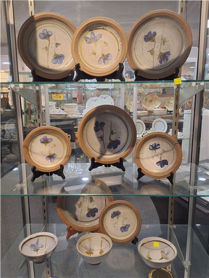 Milton Moon | A collection of plates and bowls by Milton Moon | MutualArt