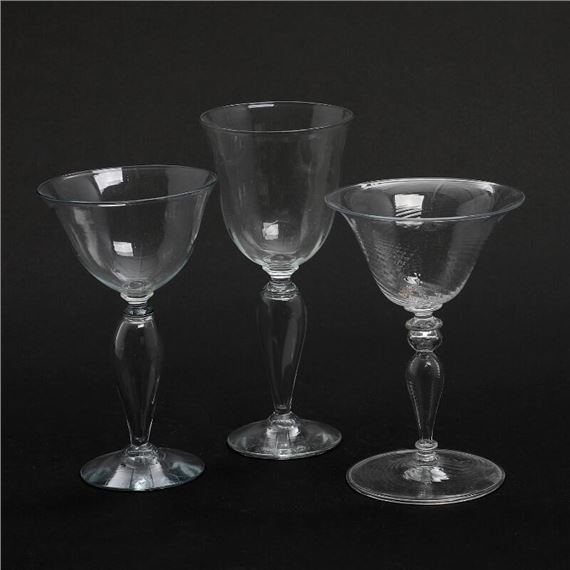 Tobias Møhl | Three clear glass wine glasses, one with relief decor ...