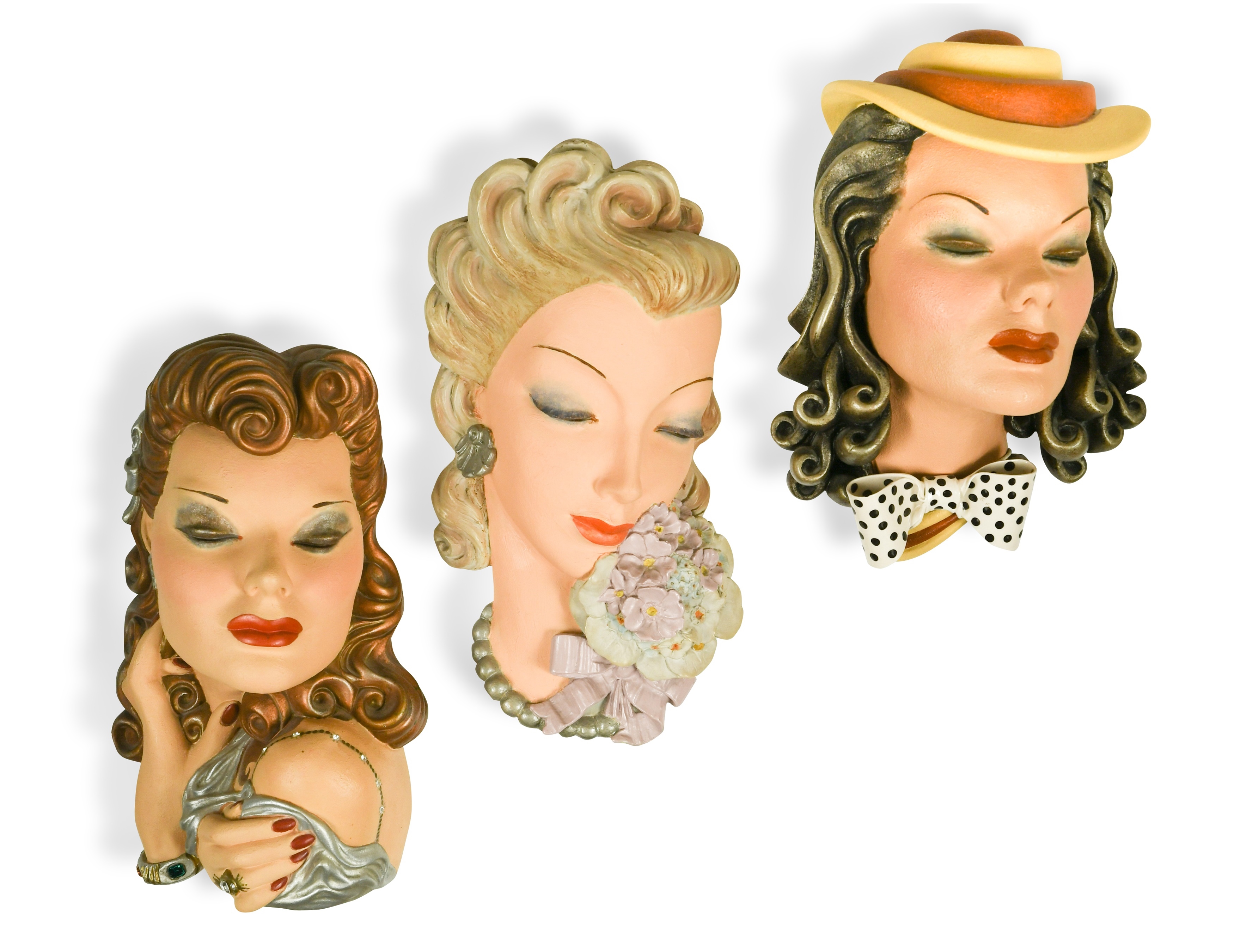 Jon Douglas | A collection of Art Deco wall masks | MutualArt