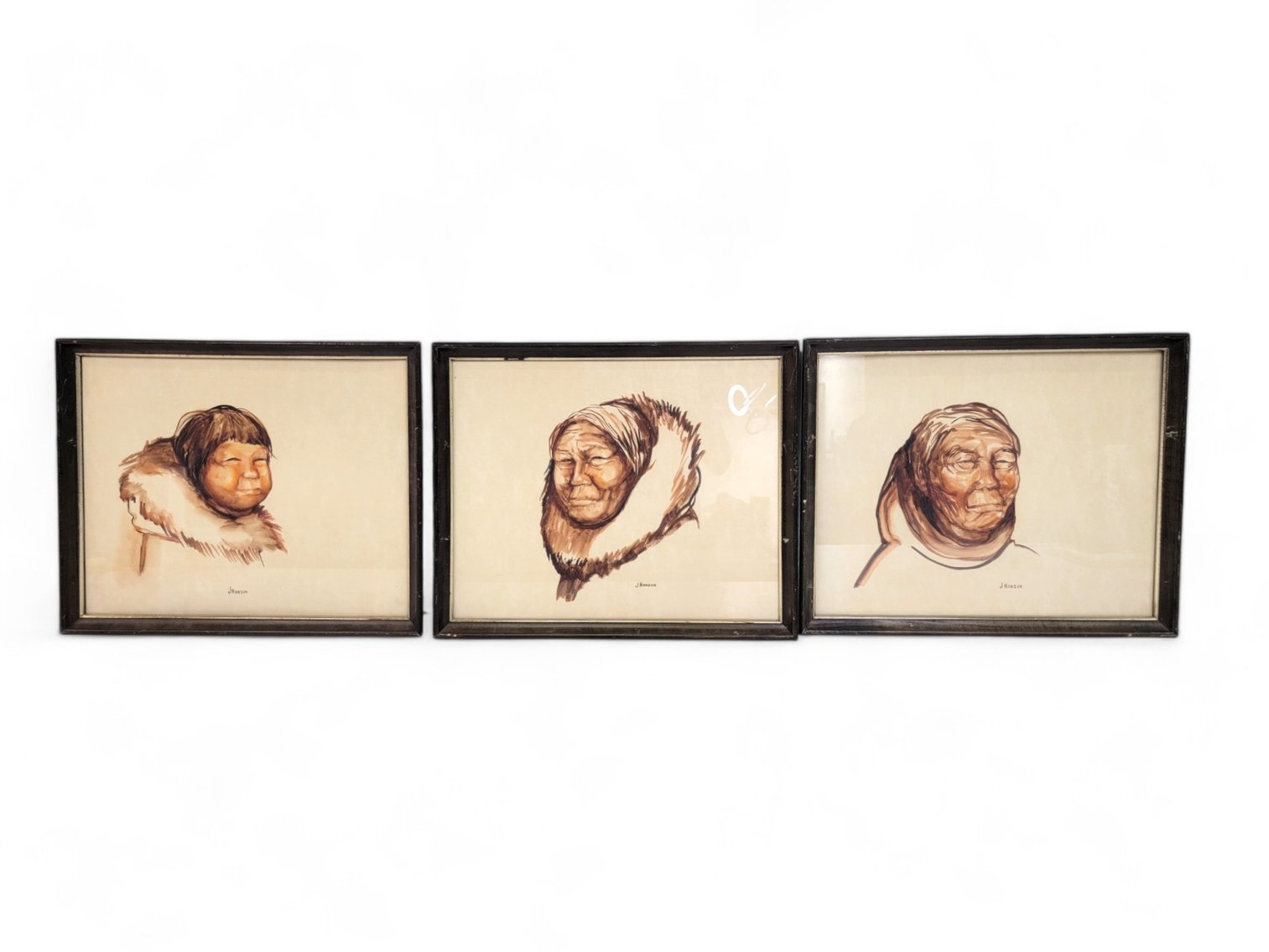 J Hanson | trio of Alaska Native portaits | MutualArt