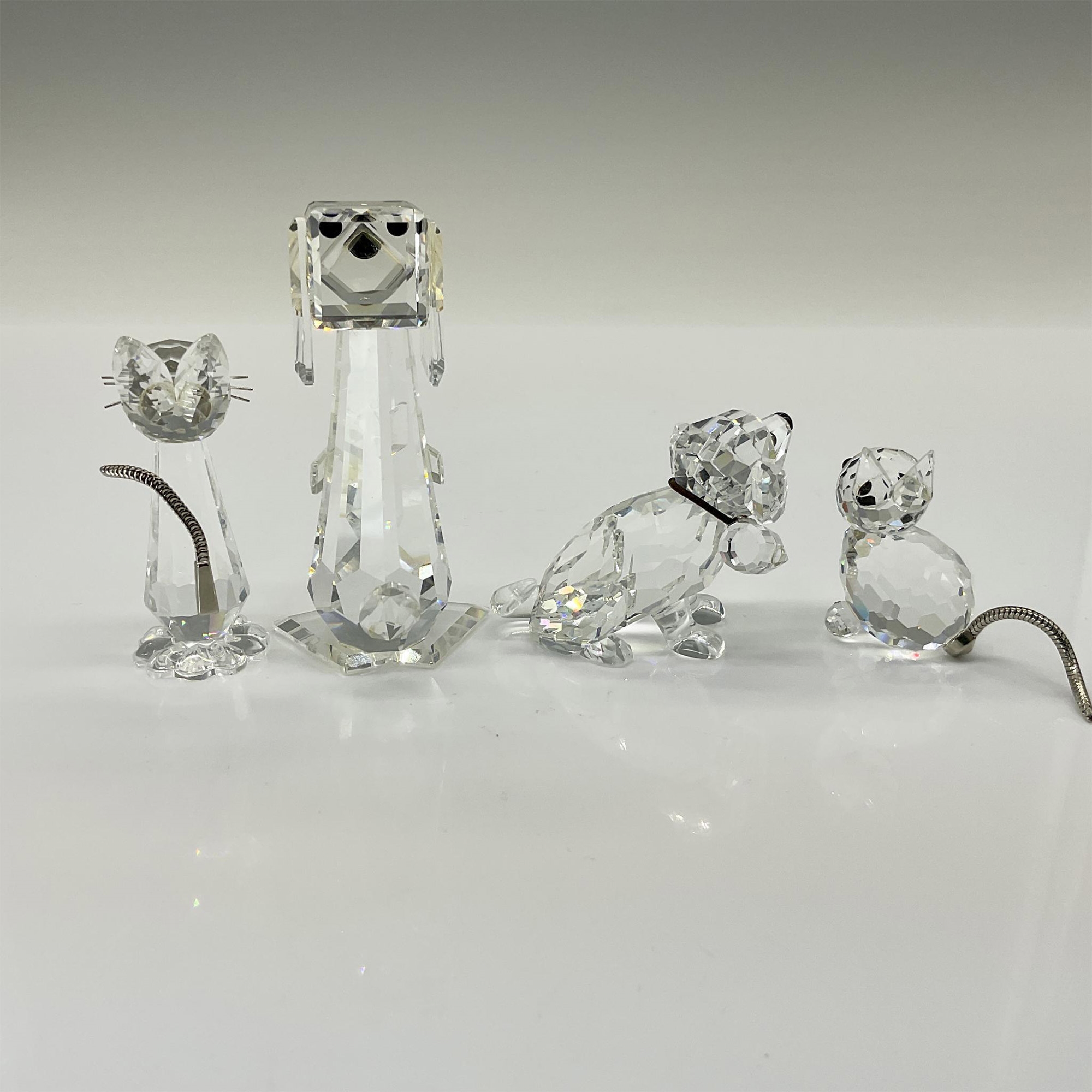 Swarovski | 4pc Swarovski Crystal Cat and Dog Figurine Grouping | MutualArt
