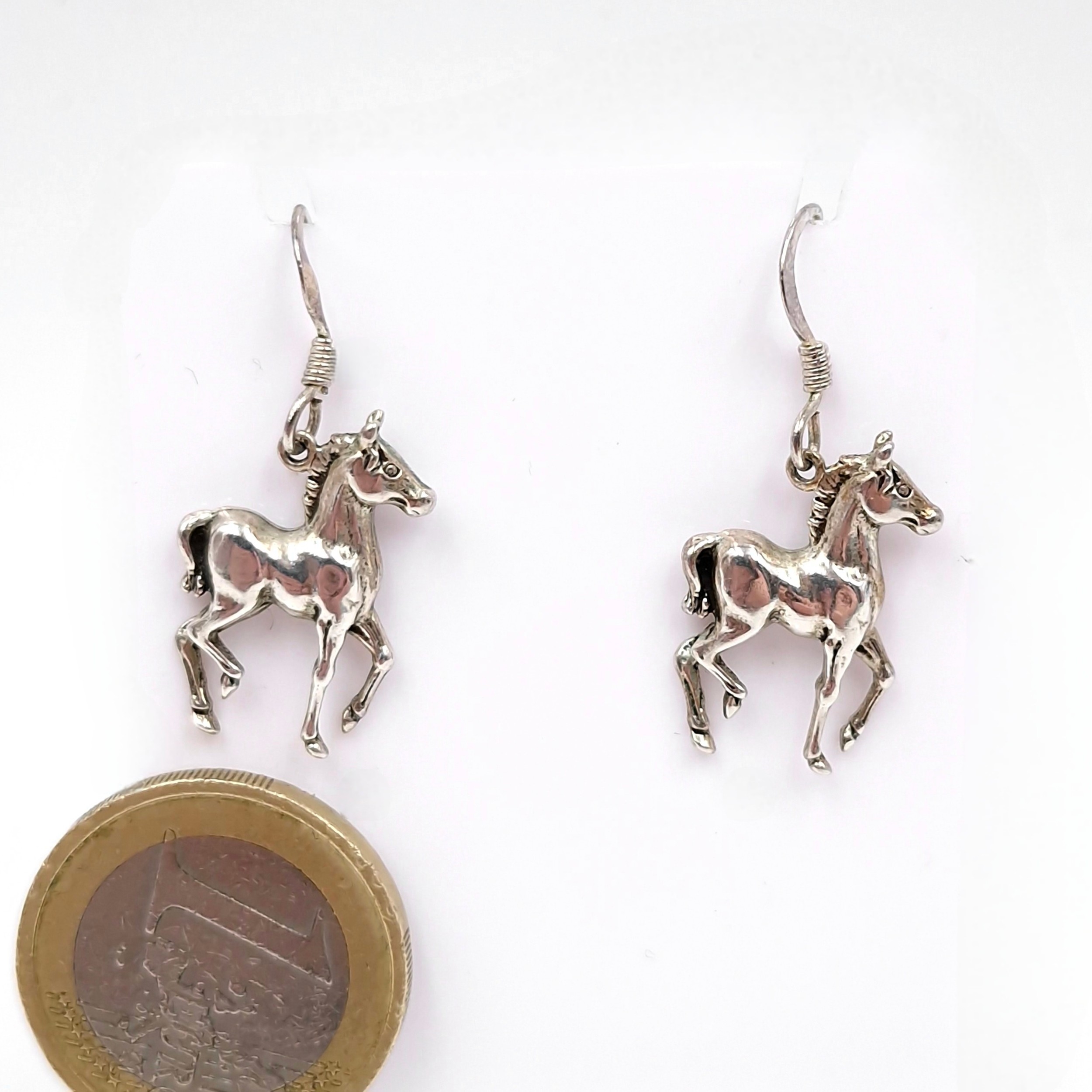 Sterling | A pair of sterling silver horse design earrings suitable for ...