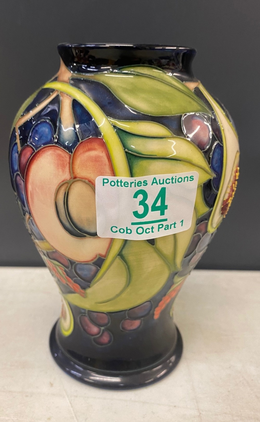 William Moorcroft | A Moorcroft Queens Choice pattern vase height 16cm ...