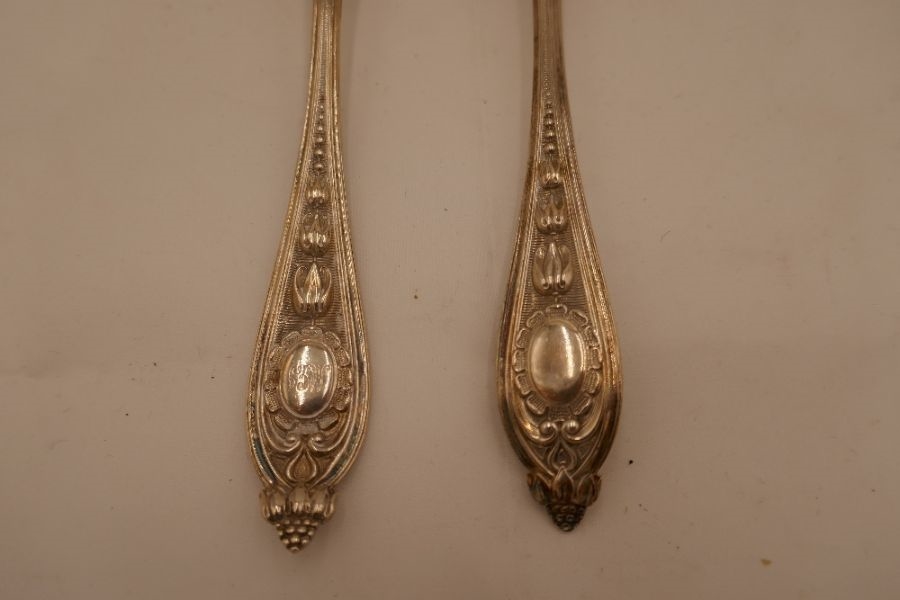 Martin Hall | A pair of Victorian silver decorated dessert spoons with ...