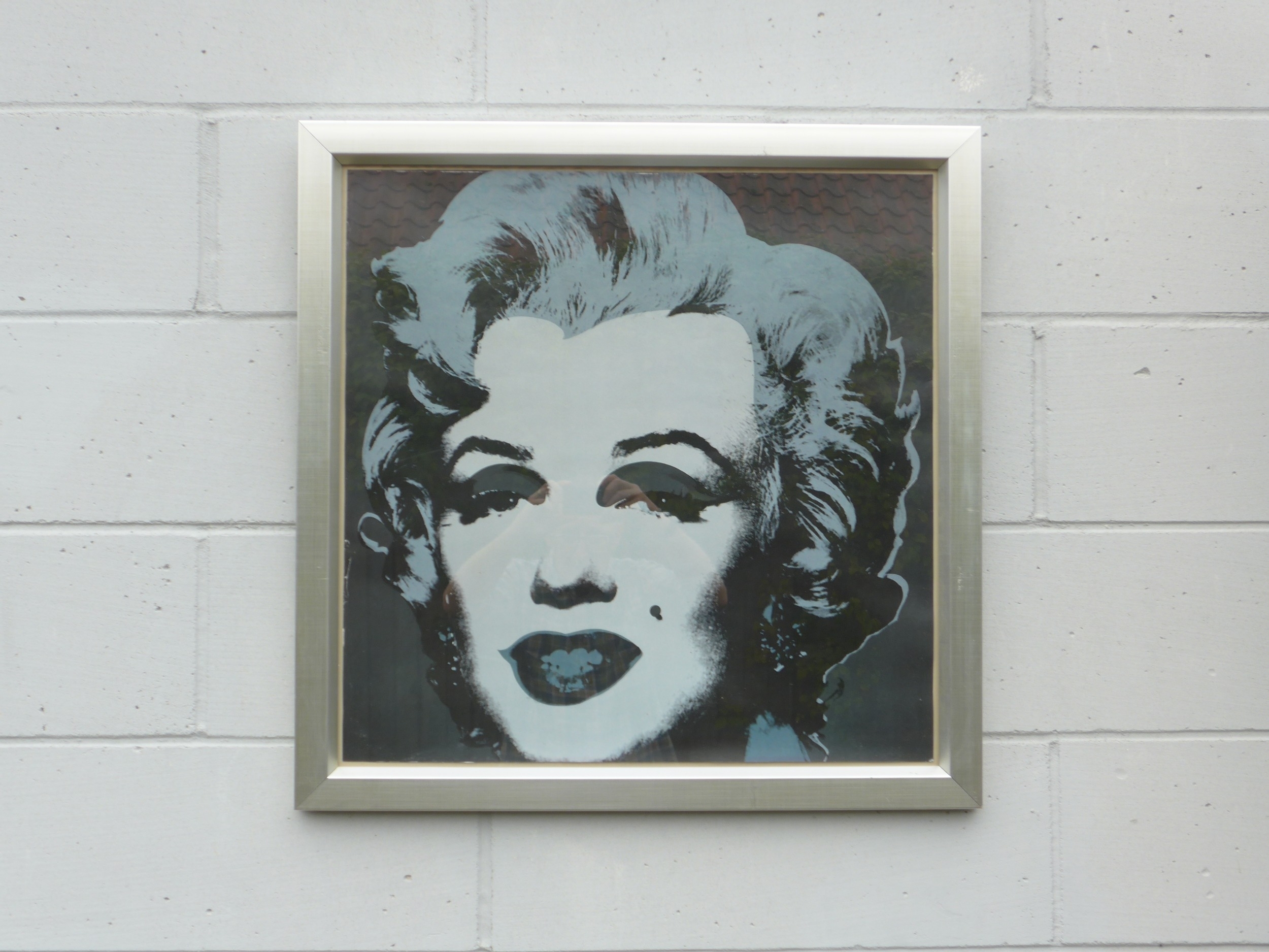 Andy Warhol | A framed Andy Warhol silver Marilyn vintage ’s art poste ...