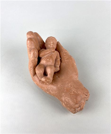 Susan Hadley | a terracotta model of a child resting in a hand | MutualArt