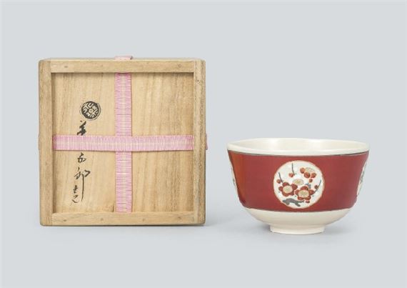 Sokuzen Eiraku | Red tea bowl with design of shochikubai and ...