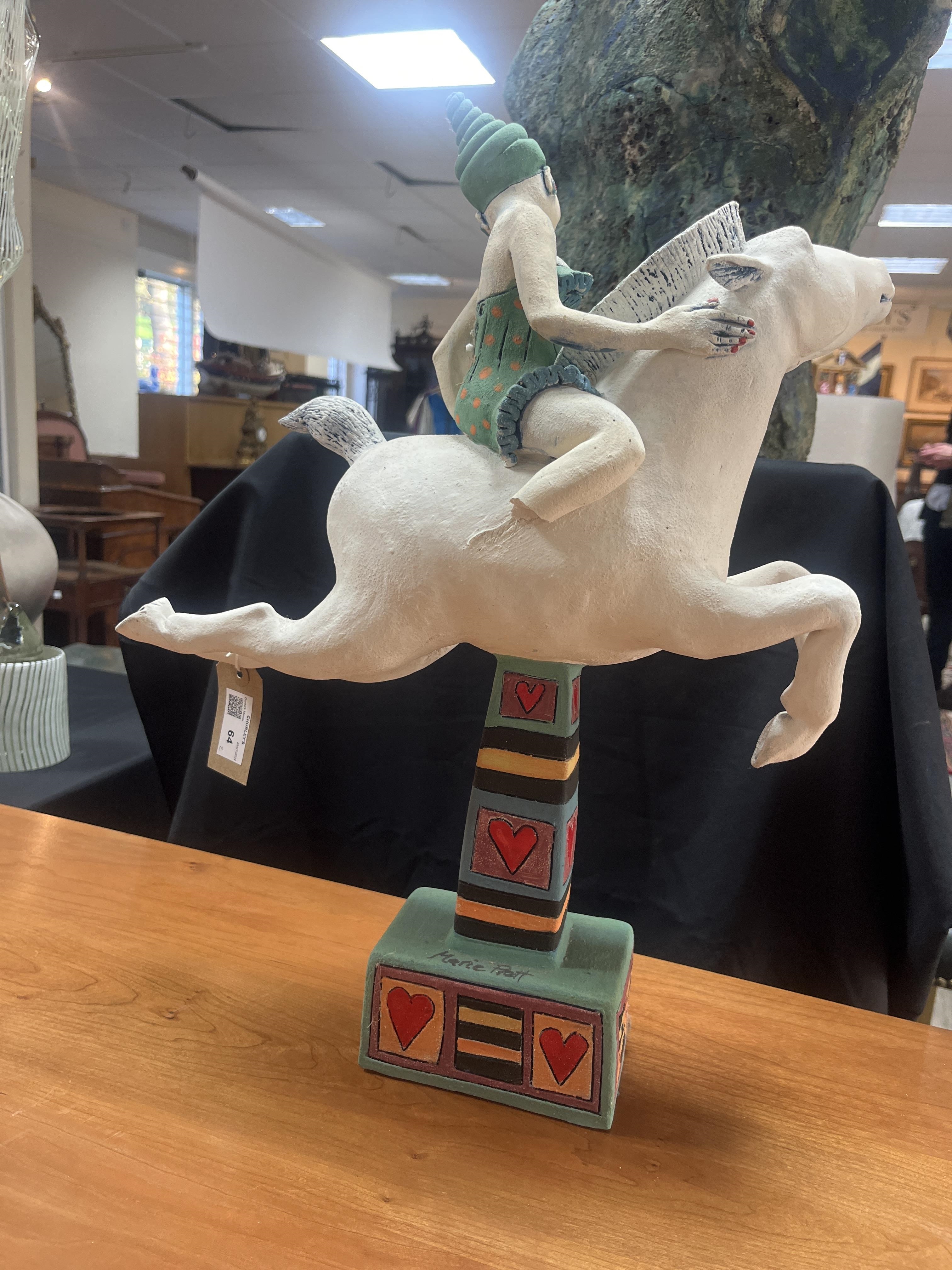 Marie Prett | A pair of Marie Prett ceramic sculptures of boy and girl ...