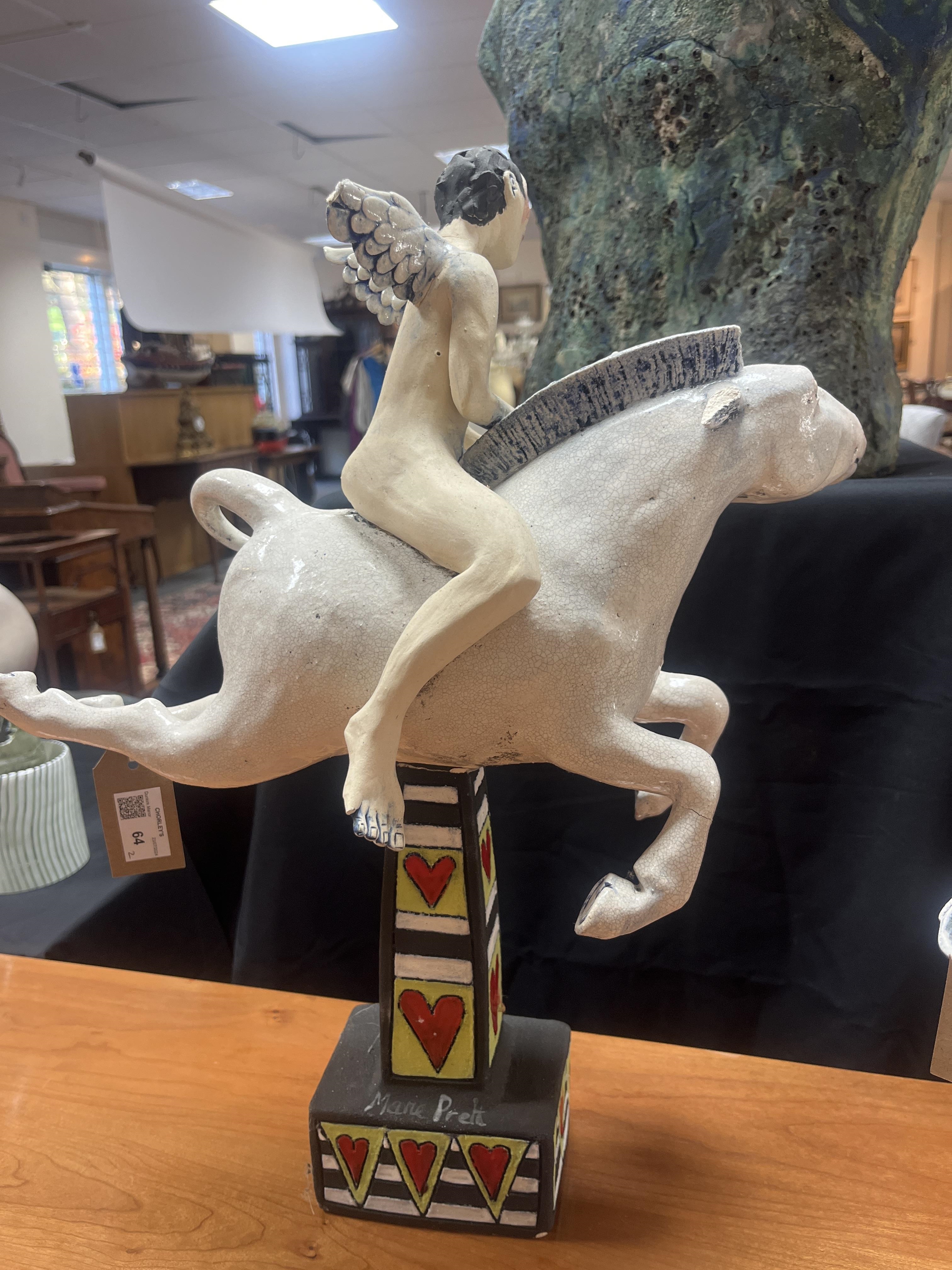Marie Prett | A pair of Marie Prett ceramic sculptures of boy and girl ...