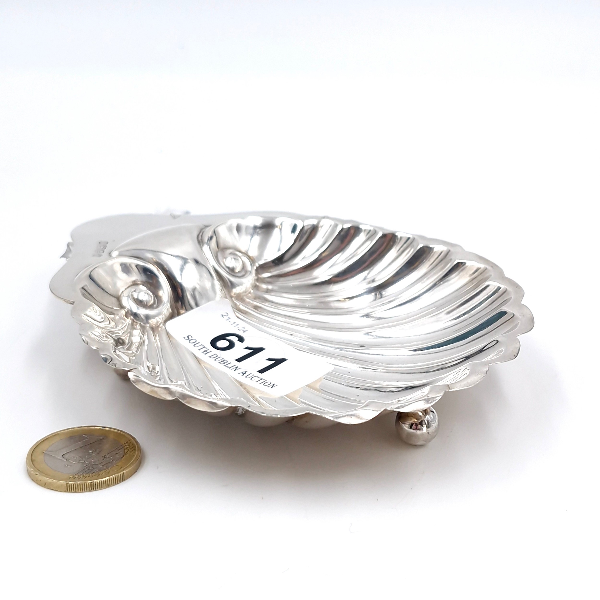 Sheffield | A very handsome shell designed dish standing on three ball ...