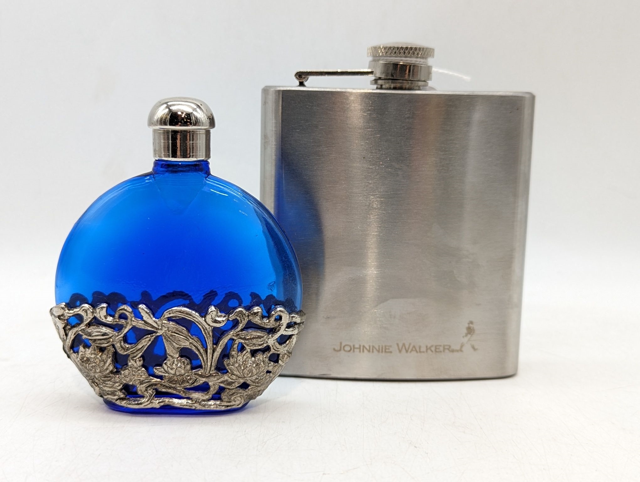 Johnnie Walker | A SILVER PLATE JOHNNIE WALKER WHISKY FLASK | MutualArt