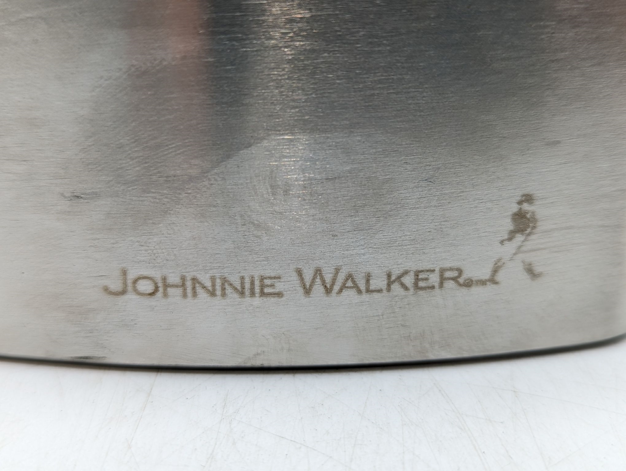 Johnnie Walker | A SILVER PLATE JOHNNIE WALKER WHISKY FLASK | MutualArt