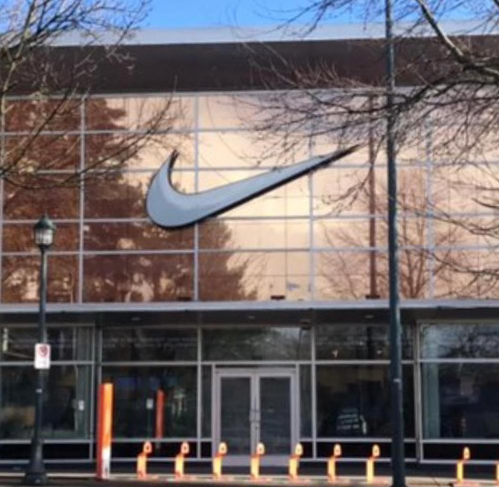 Versailles | LARGE NIKE SWOOSH EXTERIOR SIGN | MutualArt