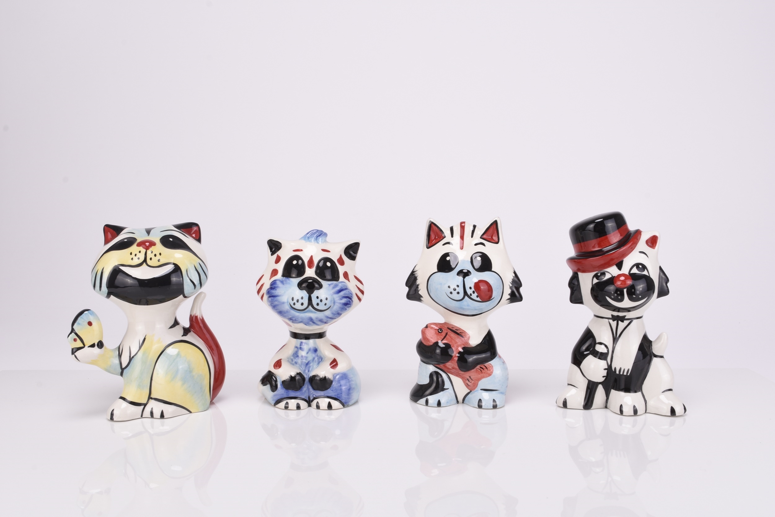 Lorna Bailey | A group of four Lorna Bailey models of cats including ...