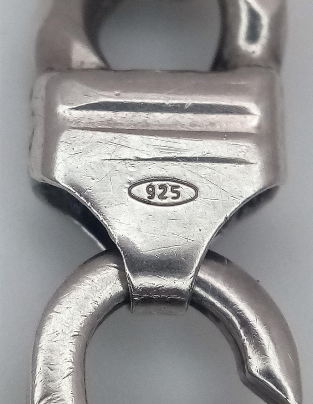 Sterling | A Sterling Silver Identity Curb Bracelet. 20cm. 34g | MutualArt