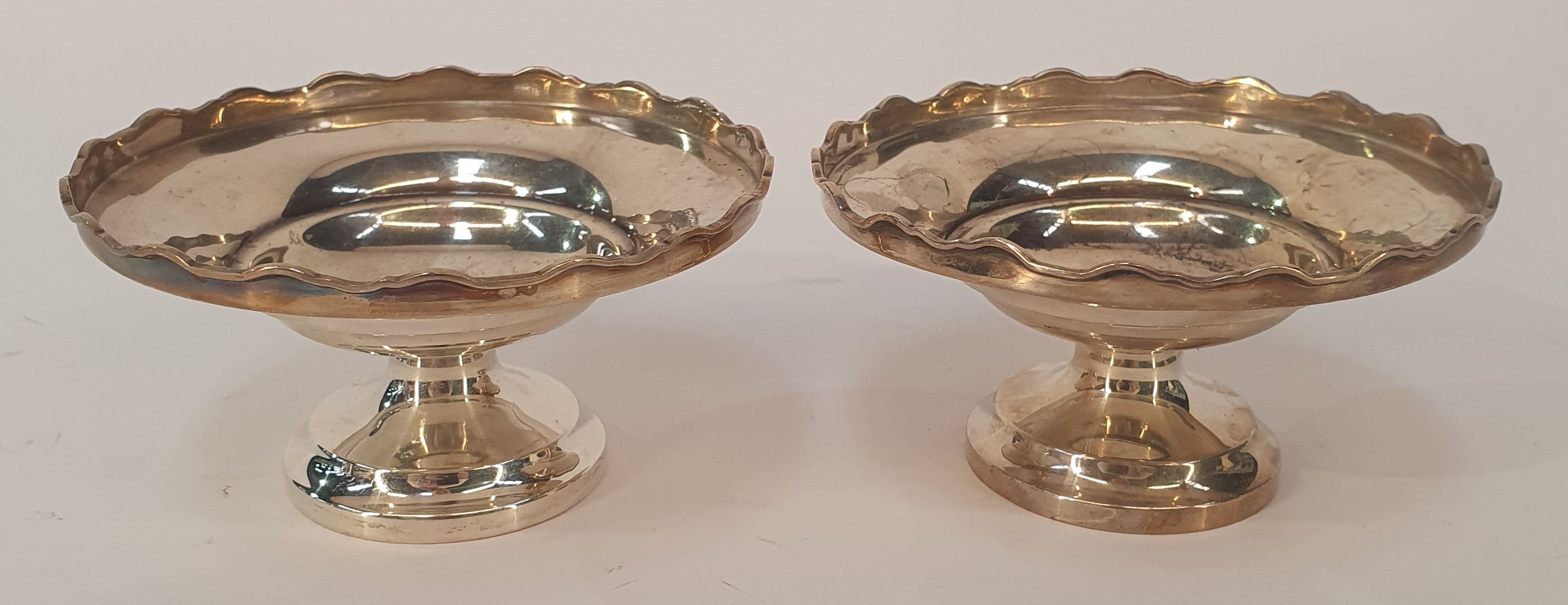 Queen Elizabeth | A PAIR OF QUEEN ELIZABETH II SILVER PEDESTAL BOWLS ...