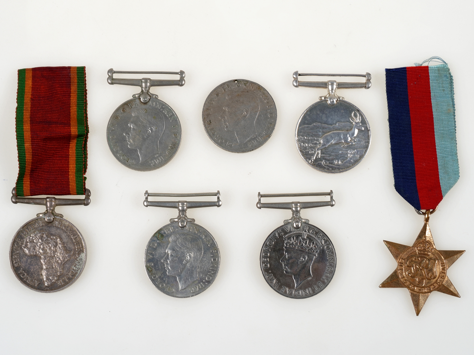 R. Davis | The War Medal 1939-1945 (un-named); and 3 x The Defence ...