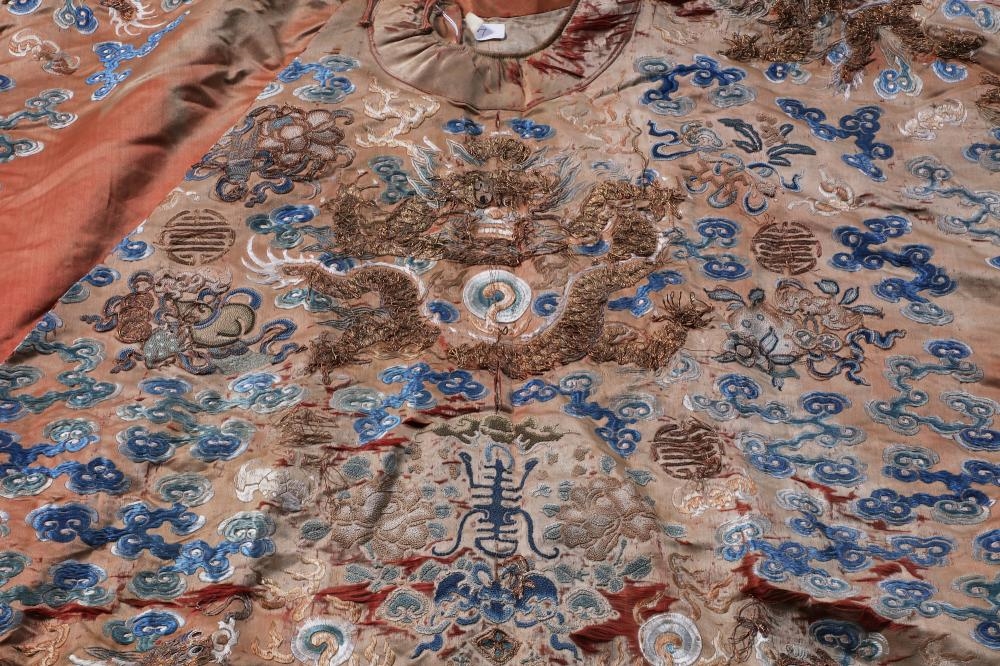 Frederick | A Chinese embroidered apricot ground silk Dragon robe ...