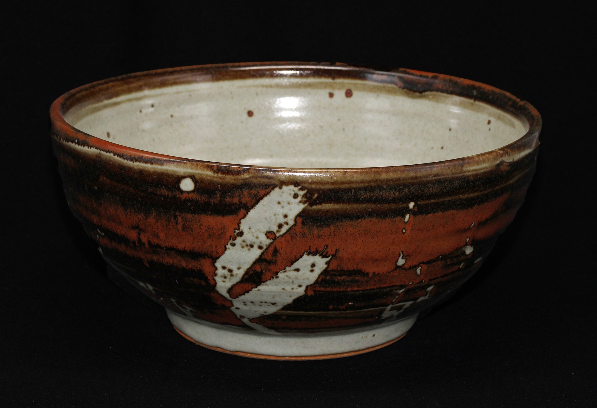 Hyme Rabinowitz | Cream and tenmoku-glazed stoneware bowl | MutualArt