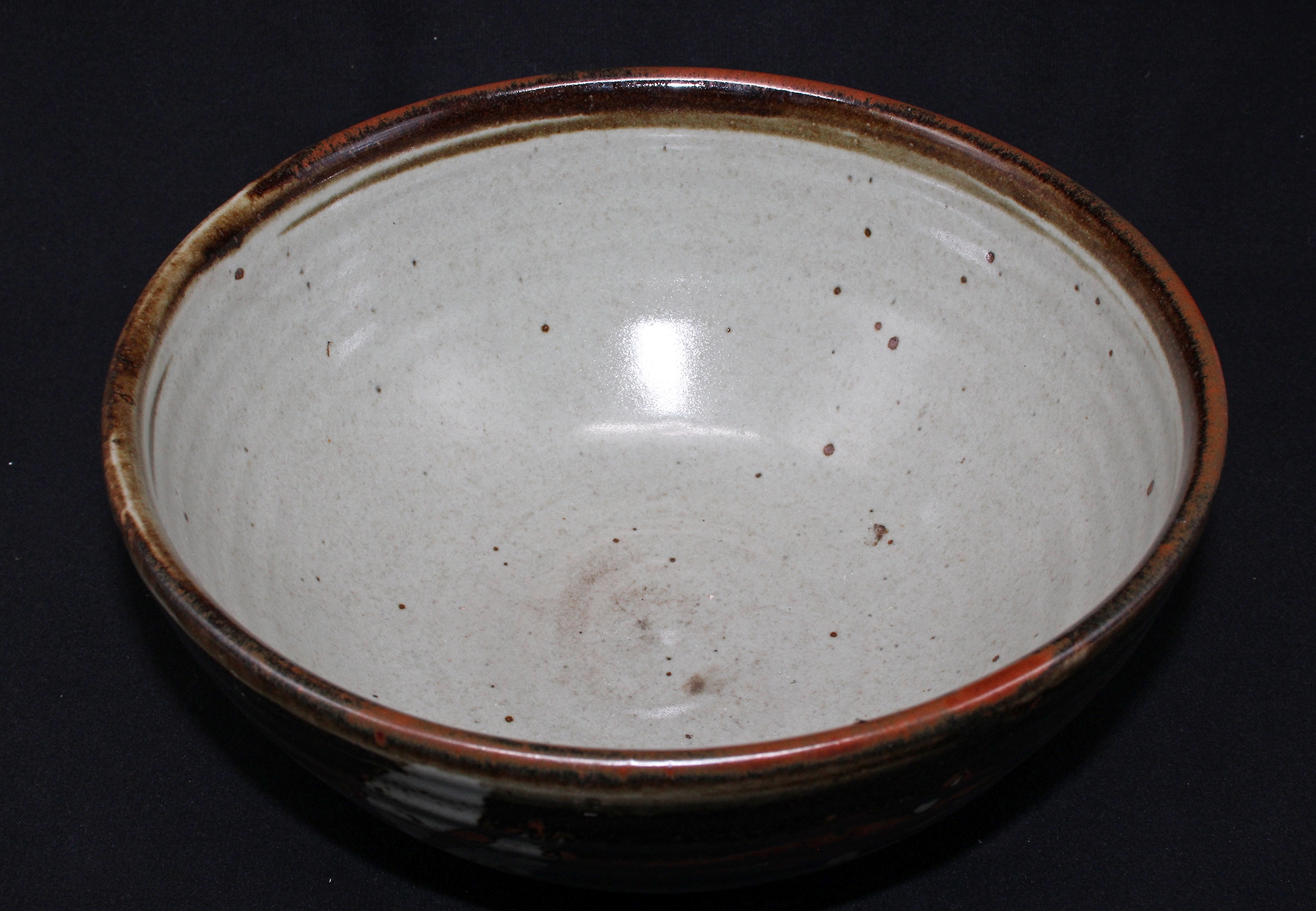 Hyme Rabinowitz | Cream and tenmoku-glazed stoneware bowl | MutualArt