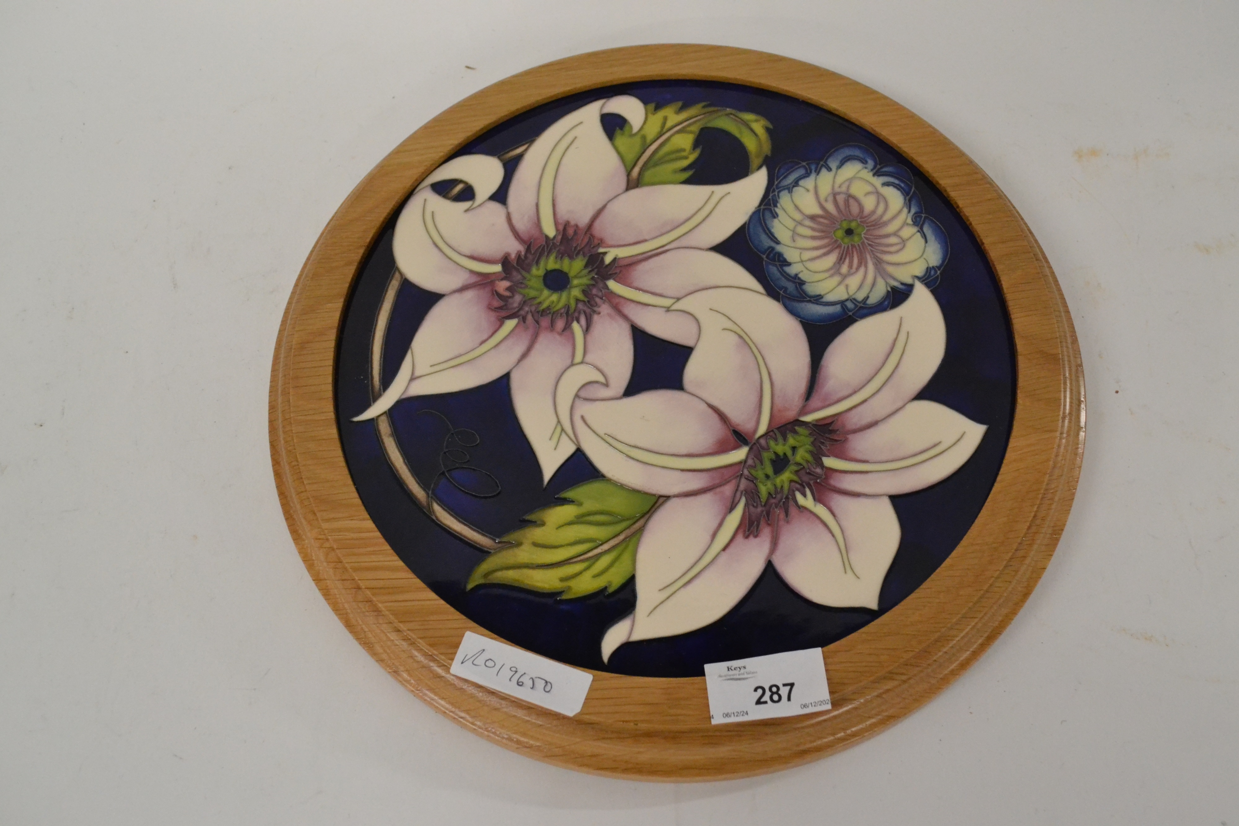 Rachel Bishop | A Wedgwood plaque in wooden frame with tubelined floral ...