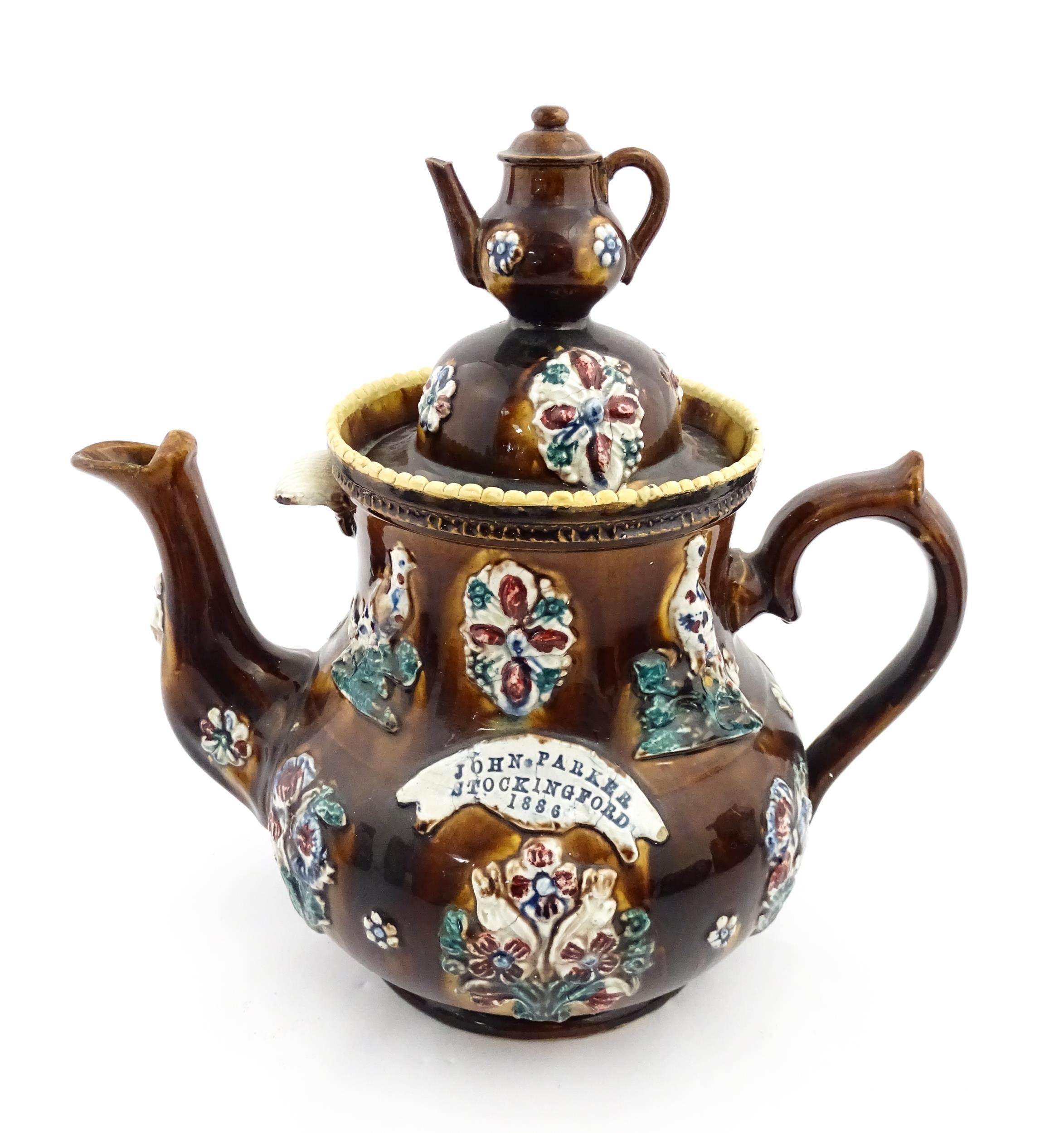 John Parker | A large Victorian Measham bargeware teapot bearing a for ...