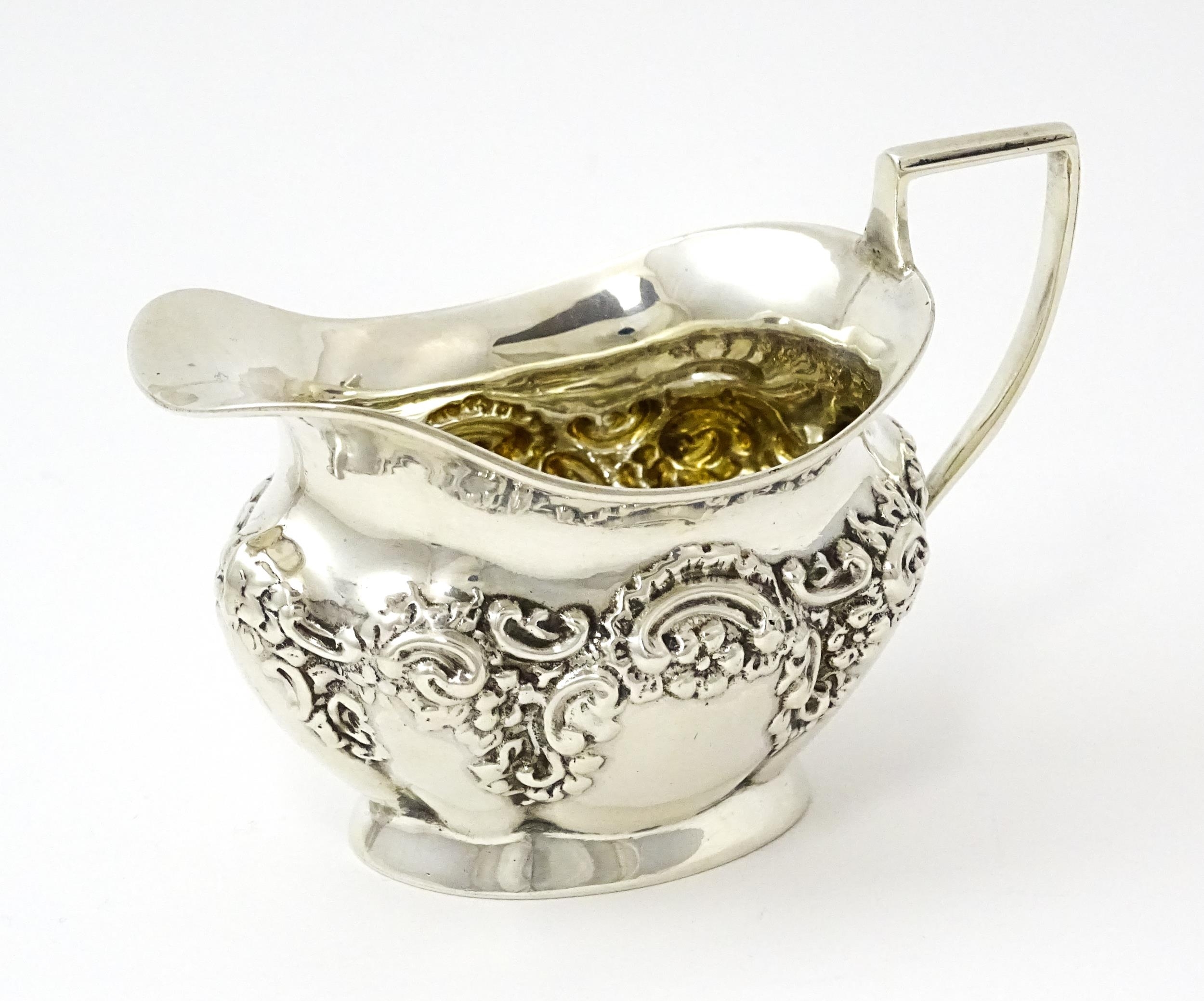 William Aitken | A jug with embossed decoration hallmarked Birmingham ...