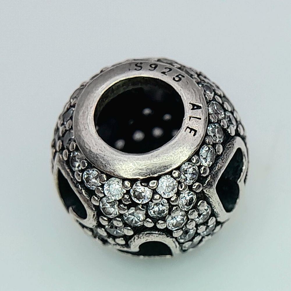 Sterling | A PANDORA STERLING SILVER STONE SET CUT OUT | MutualArt