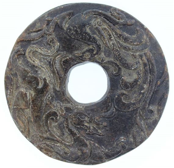 Chinese School | Antique Chinese Jade Wheel with carved Dragon & Bird ...