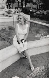 Sam Shaw | Marilyn Monroe Sitting at a Fountain (1957) | MutualArt